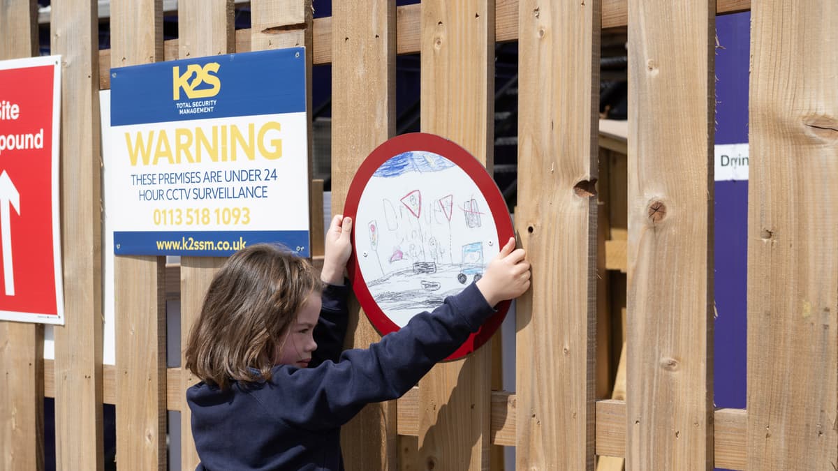 Children design speed awareness signs for Trull housing development ...